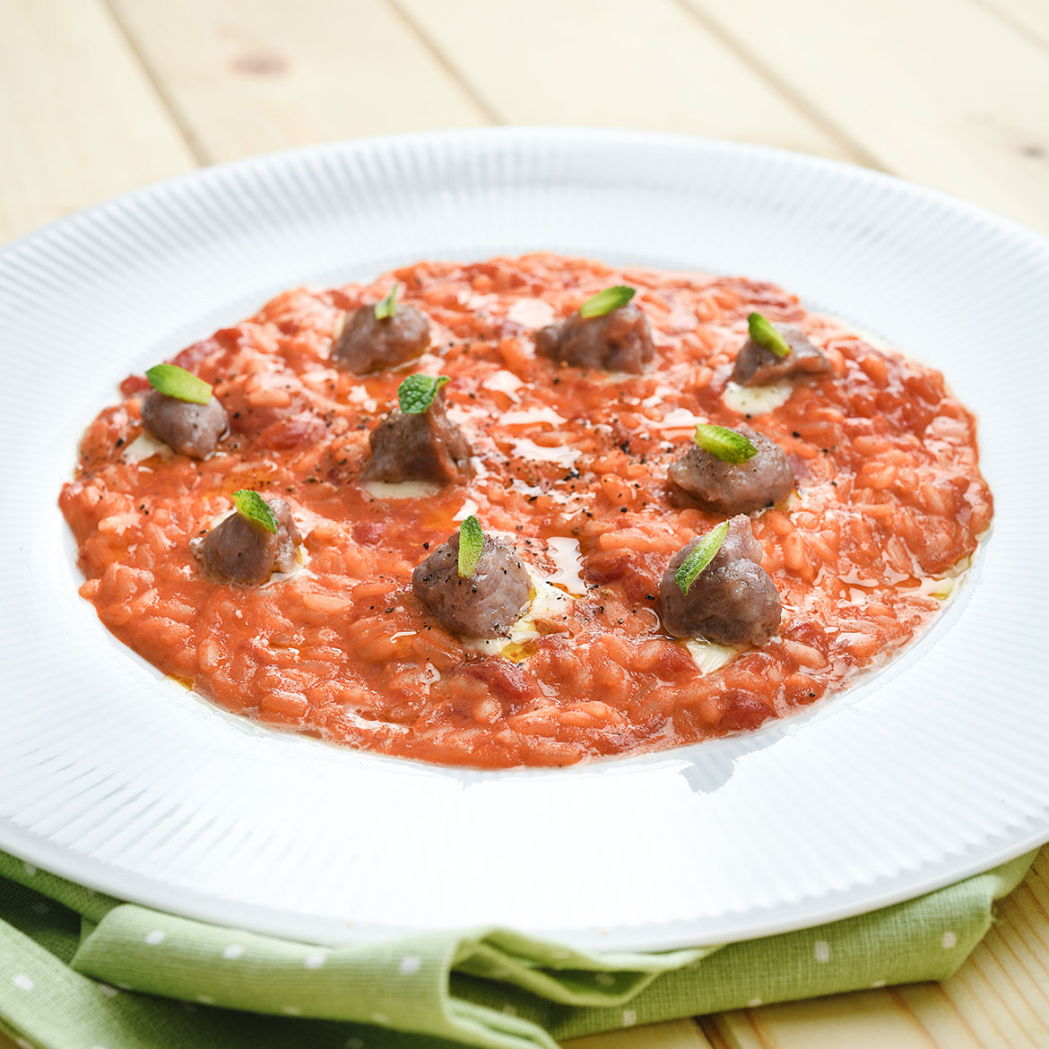 Risotto al pomodoro con salsiccia, ricotta e menta | AIA Food